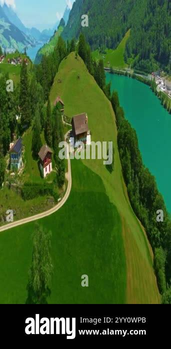 Aerial view of beautiful swiss mountains in summer. Drone view of green ...