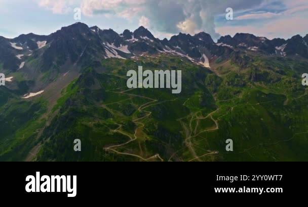 Aerial view of beautiful swiss mountains in summer. Drone view of green ...