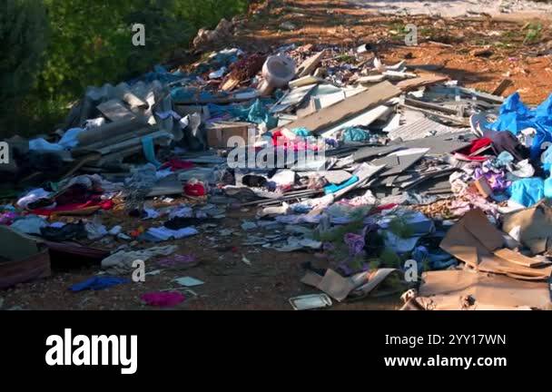 Athens, Greece-December 11,2024 .Camera movement around trash and ...