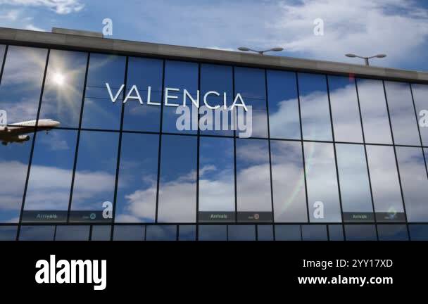 Plane landing at Valencia, Spain. Arrival in the city with the glass ...