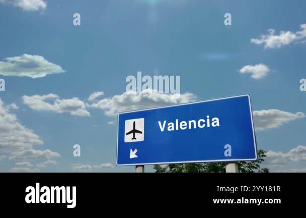 Valencia Spain Jet plane landing. City arrival with airport direction ...