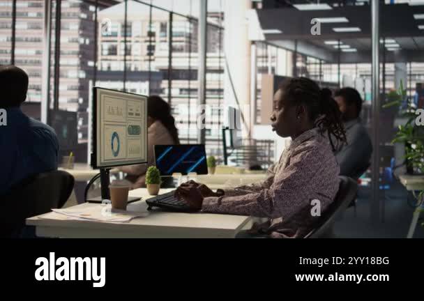 Female manager engaged in budget analysis and strategy development at ...