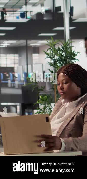 Vertical Video Successful businesswoman manages financial planning and ...