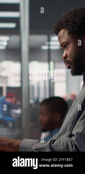 Vertical Video Analyst studying infographics and performance metrics ...