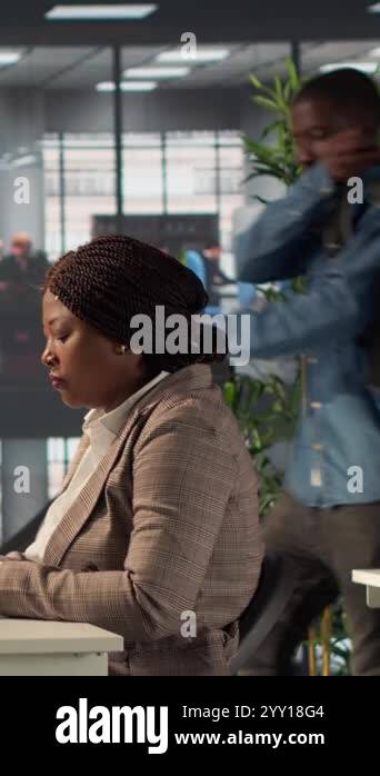 Vertical Video Corporate woman employee receiving a food delivery at ...