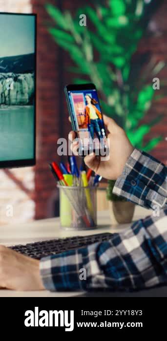 Man at home having fun looking at social media reels done by online ...