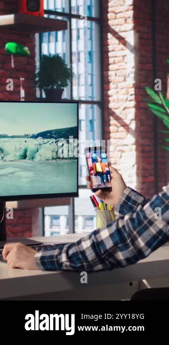 Man at home having fun looking at social media reels done by online ...