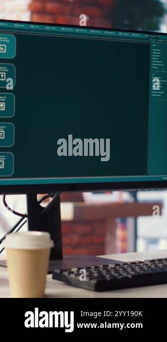 Focus on AI LLM chatbot PC GPT software on PC monitor in home office. Panning shot of large ...