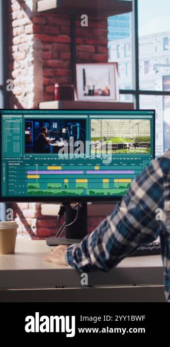 Remotely working videographer doing video montage using specialized ...