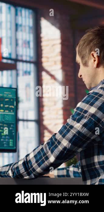 Man doing remote work on computer screen, moving assets in 3D modeling ...