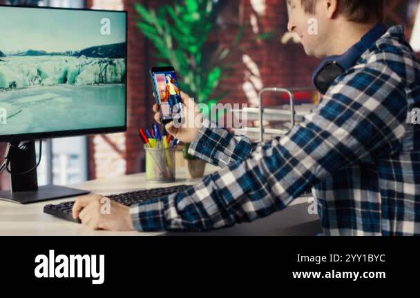Man at home having fun looking at social media reels done by online ...