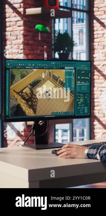 Man doing remote work on computer screen, moving assets in 3D modeling ...