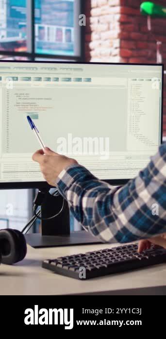 Programmer At Desk Types Code Into Computer Developing Software Programs Entering Commands