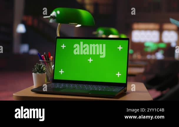 Scholars writing essays in a library with an isolated display for their ...