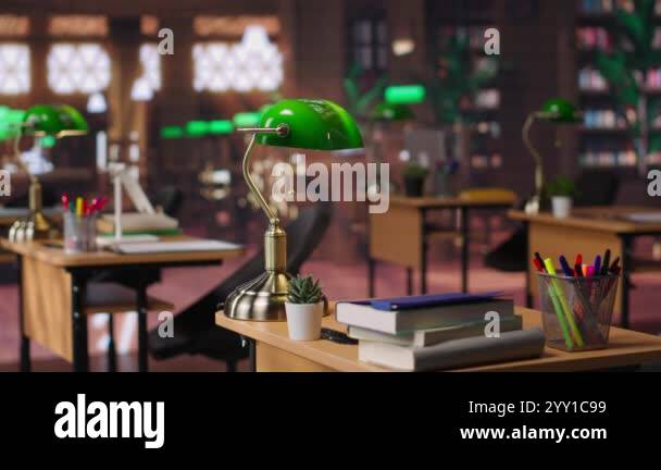 Refined vintage library with wooden shelves and classic green lamps, a ...