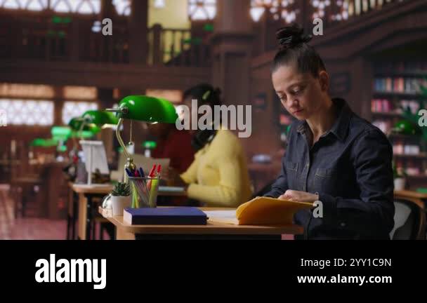 Teacher preparing class notes and learning materials for a teaching ...