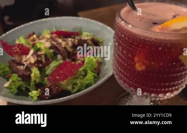 Raw beef dish garnished with parmesan cheese and leaves at a fine ...