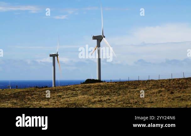 Two Wind Turbines Spinning Big Island Hawaii Blue Sky White Clouds And ...