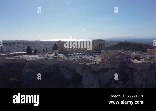 An aerial video of the Parthenon and Acropolis in Athens, Greece, showcasing the ancient ruins ...