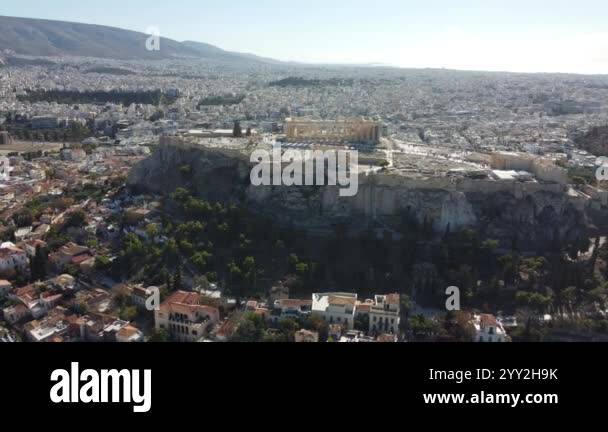 Spectacular 4K drone footage capturing an aerial view of the Acropolis and Parthenon in Athens ...