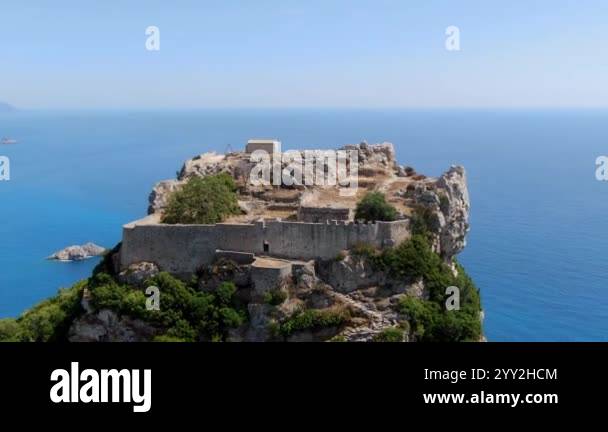A breathtaking aerial view of Angelokastro, a Byzantine castle perched ...