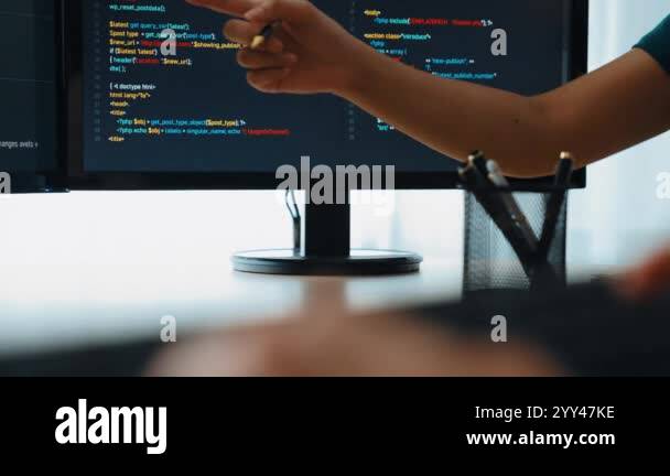 Slow motion back end software developer engineer for computer programming working together on ...