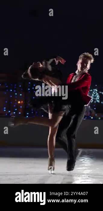Figure skating motion blur, young couple performs a dramatic dance on ...