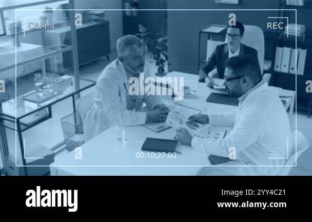 CCTV camera footage of two male doctors and female clinical director ...