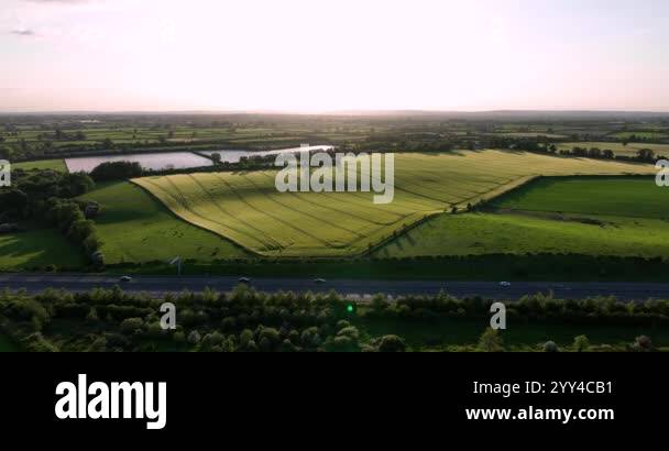 Stunning aerial landscape showcasing vibrant green fields and a ...
