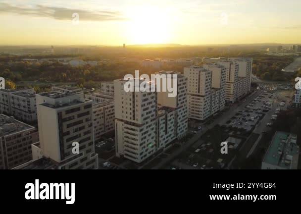 Modern high-rises and parking lots at sunset Stock Video Footage - Alamy