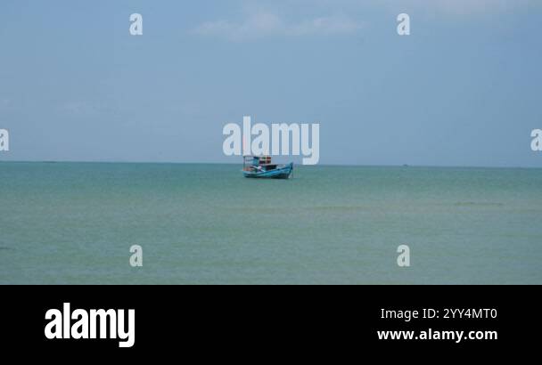 Front view of fishing boat on ocean with harsh sun. High quality FullHD ...
