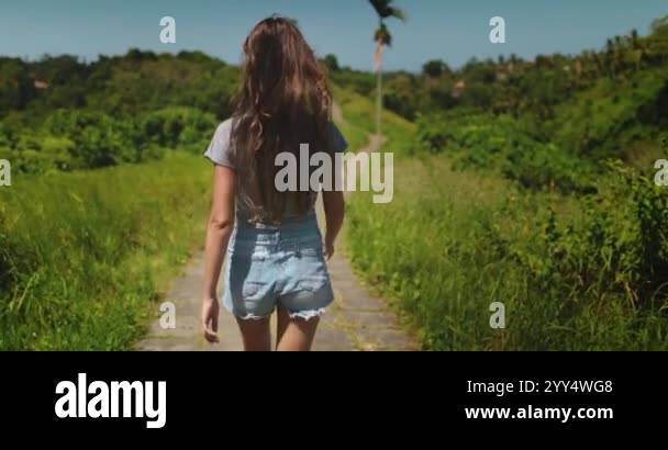 Woman walking Campuhan Ridge Walk Trail, Indonesia, Bali island, Ubud ...