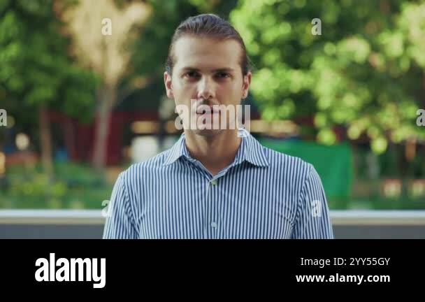 Smiling Man on Video Call Using Sign Language to Say That He Misses ...