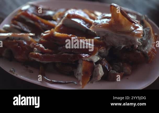 Whole piglet roast suckling pig Chinese food pork menu serve 4k Stock ...