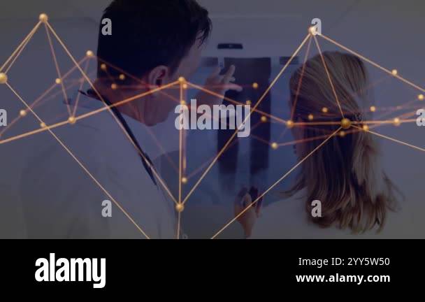 Examining X-ray with network connections animation, doctors focusing on ...
