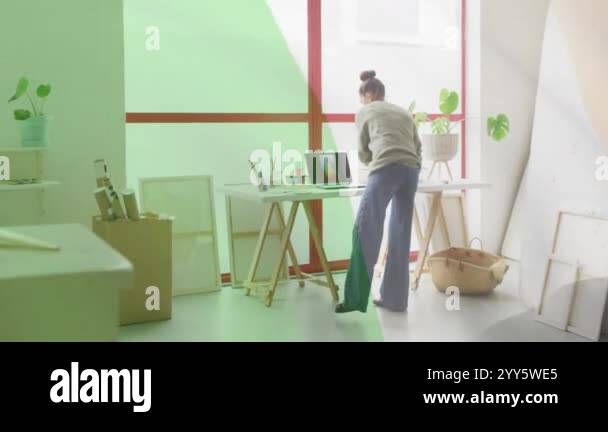Walking in art studio, woman surrounded by ireland flag animation ...