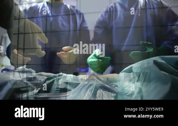 Medical team performing surgery over grid animation. healthcare ...