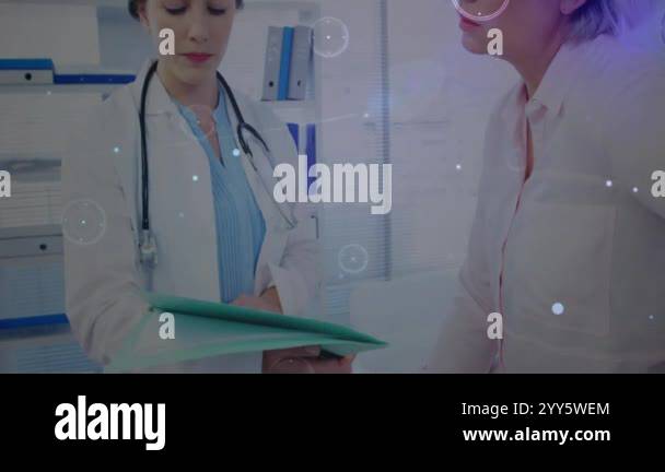 Medical consultation animation over doctor and patient in clinical ...