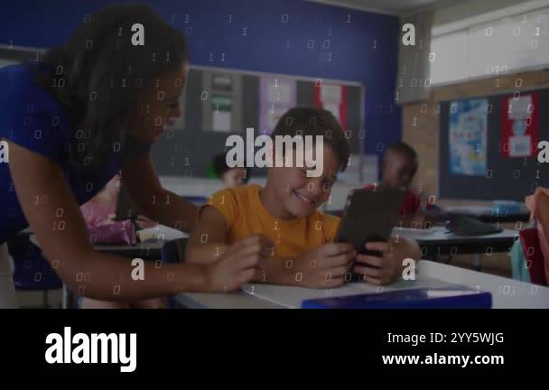 Binary code animation over students using tablets in school classroom. Technology, education ...