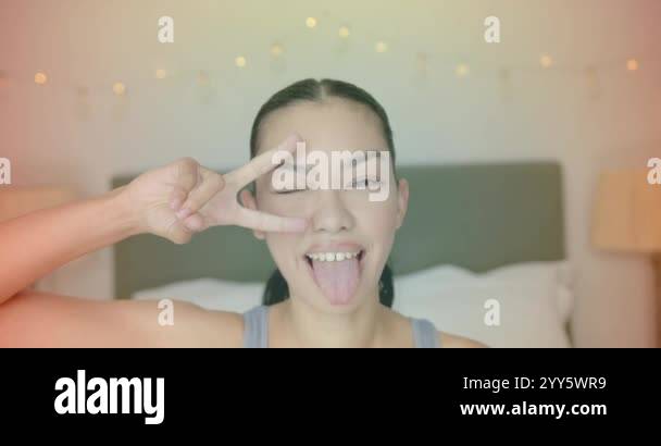 Winking and sticking out tongue, person with rainbow hearts animation ...
