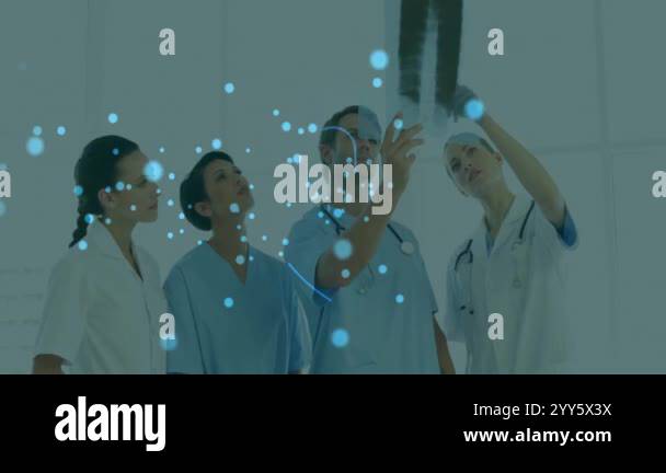 Medical professionals examining X-ray with cybersecurity shield ...