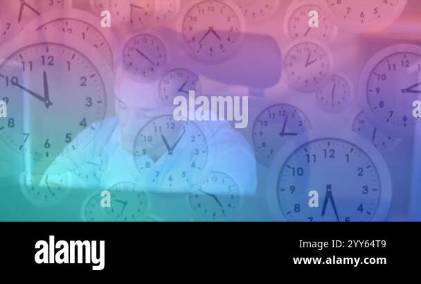 Working on computer in office, man with clocks animation in background ...