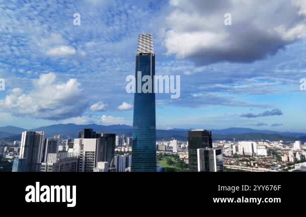 Aerial view of Menara Exchange 106 building with blue sky background ...