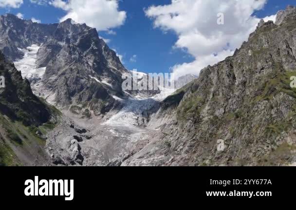 Aerial view of rocky slopes on the way to Chalaadi Glacier near Mestia ...