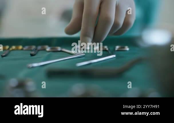 Close-up of surgical instruments on a sterile table in an operating ...