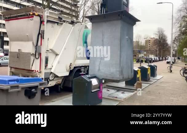 Delft, Netherlands, 10 December 2024: The weekly cleansing of garbage ...