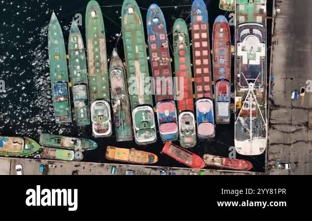 Sunlight reflection over the Fishing Boats and turquoise ocean water ...