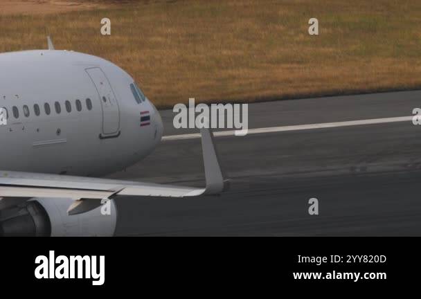 Close-up footage of a jet plane gaining speed before takeoff. Flight ...