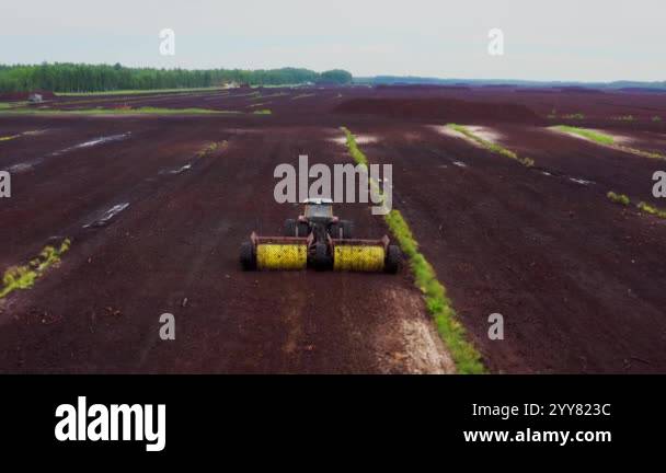 Peat extraction harvesting fields aerial view. The drained areas of the ...