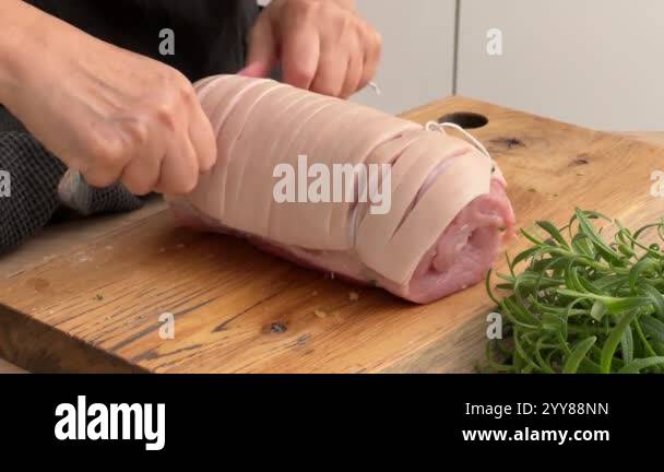 cook housekeeper tie with string pork chop roll filled with breadcrumbs ...